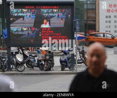 Screen of cctv cameras with facial recognition and social credit ...