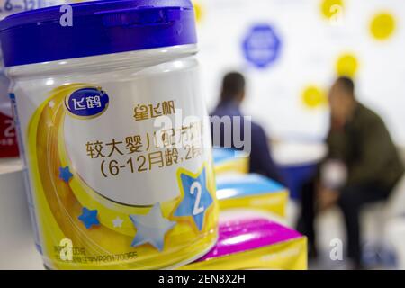 --FILE--Tins of Firmus milk powder of Feihe Dairy are displayed during ...