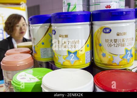 --FILE--Tins of Firmus milk powder of Feihe Dairy are displayed during ...