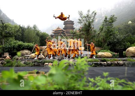 Henan,CHINA-Shaolin boys practice kung fu in the sweltering heat during ...