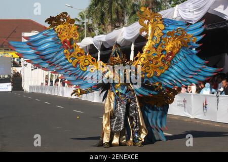 A model in a Carnaval costume during Indonesia's independence day ...
