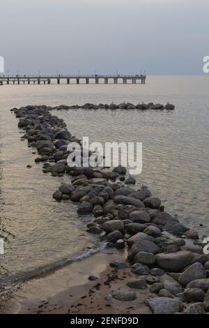 Anti-wave dam. Large stones by the sea Stock Photo - Alamy