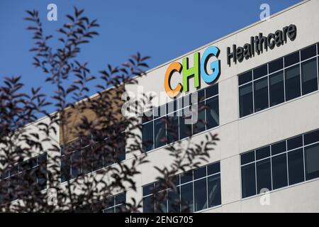 A logo sign outside of the headquarters of CHG Healthcare in Midvale ...