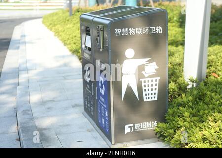 An artificial intelligence (AI) garbage sorting bin is displayed at ...