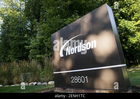 A logo sign outside of the headquarters of the Nordson Corporation in ...