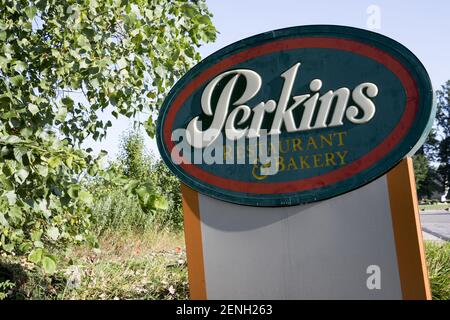 A logo sign outside of a Perkins Restaurant & Bakery location in Avon ...