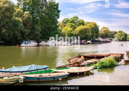 Thames riverfront with many boats in Richmond, London, UK Stock Photo ...