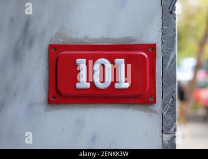 House number one hundred. Red lettering on white background Stock Photo ...