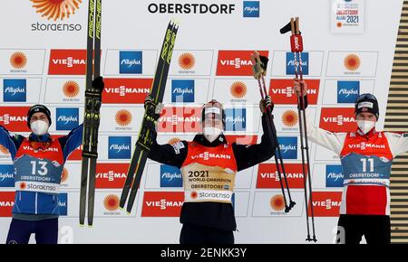 Third placed Ilkka Herola of Finland on the podium after 7,5 km Cross ...