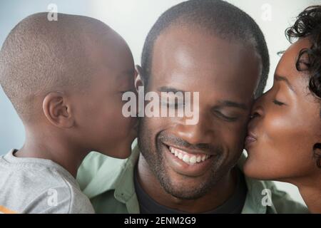 Close-up portrait of loving adolescent Caucasian boy smiling and ...
