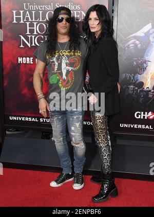 (L-R) Slash and Meegan Hodges arrives at the Opening Night of Universal ...