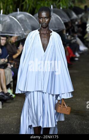 Model Amar Akway walking on the runway during the Dries van Noten Ready ...