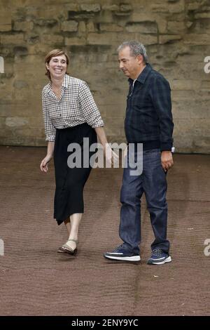 Judith Touitou and Jean Touitou walking on the runway during the A.P.C ...
