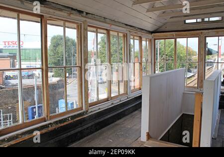 inside an old wooden railway signal box showing points and signal ...