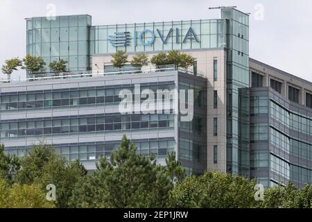 A logo sign outside of the headquarters of IQVIA in Durham, North ...