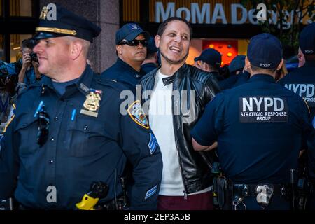 A pro-Puerto Rico activist is getting arrested outside the MOMA at a ...