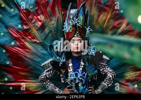 An artist uses Javanese traditional clothes during The Jogja Fashion ...