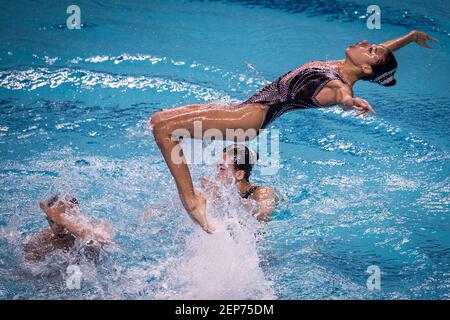 Swimmers do water ballet at the free combination synchronized swimming ...