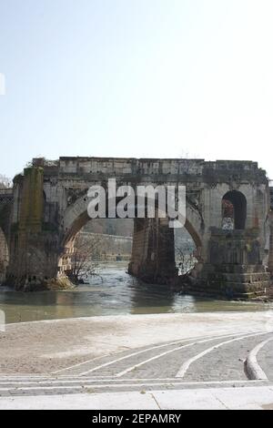 Ancient Pons Aemilius bridge and the Tiber Island Rome Italy Stock ...