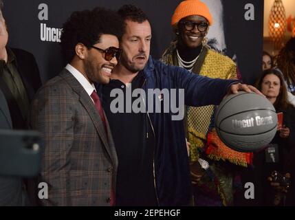 (L-R) The Weeknd and Adam Sandler at the UNCUT GEMS Los Angeles ...
