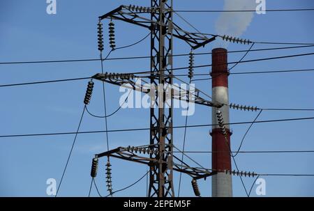 electric pylon and pipes of coal burning power station Stock Photo - Alamy