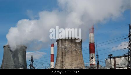 electric pylon and pipes of coal burning power station Stock Photo - Alamy