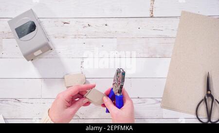 Flat lay. Step by step. Cutting out snowflakes with cookie cutters out ...