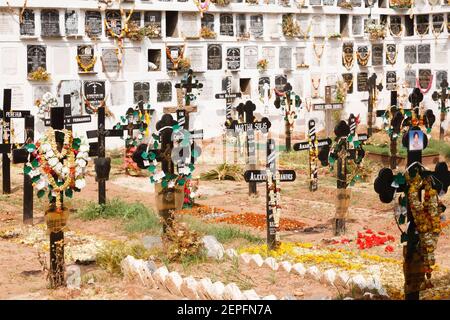 PANAJI, INDIA - November 07, 2011. Columbarium wall at a burial ground ...
