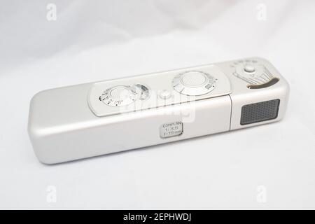 Close-up of Minox B Subminiature film camera concealed in a man's hand ...