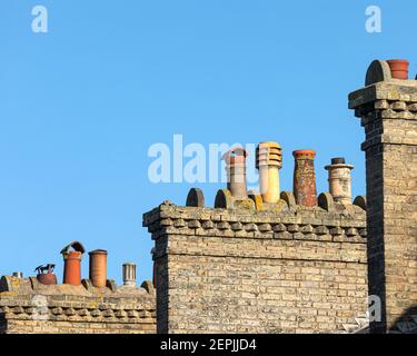Ornate chimney pots and brick chimney stack Stock Photo - Alamy