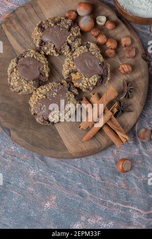 Chocolate crocante cookies with cinnamon flavour on a pink background ...