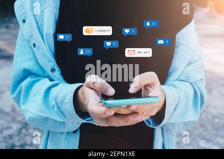 Woman happy play social media on smartphone with communication icon ...