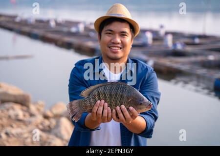 Big plentiful fat tilapia fish isolated on white background Stock Photo ...