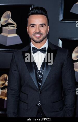 Luis Fonsi arrives at the 60th Annual GRAMMY Awards red carpet at ...