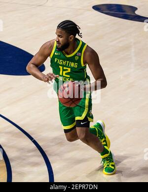 Oregon guard LJ Figueroa (12) runs up the floor during the first half ...