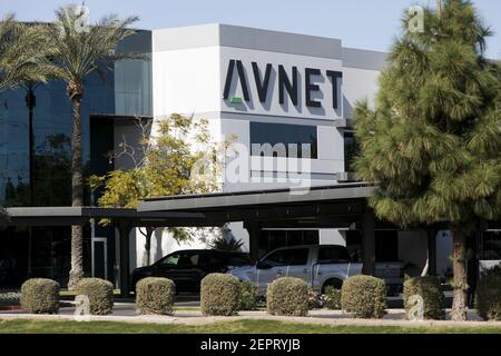 A logo sign outside of the headquarters of Avnet, Inc., in Phoenix ...