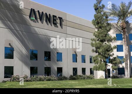 A logo sign outside of the headquarters of Avnet, Inc., in Phoenix ...