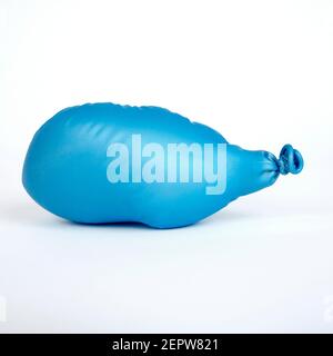 The deflated blue balloons isolated on white background Stock Photo - Alamy