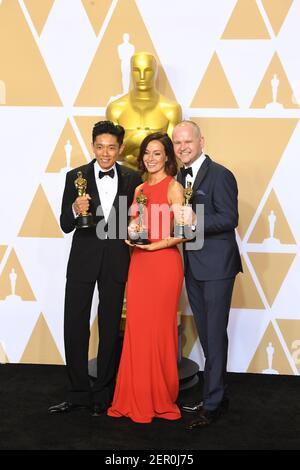 Kazuhiro Tsuji, Lucy Sibbick and David Malinowski with their award for ...