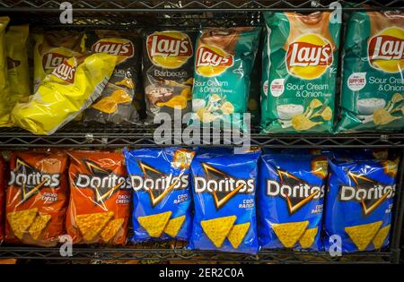 A display of tasty Frito-Lay brand chips and snacks in New York on ...