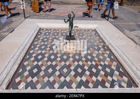 Bronze statue of the Dancing Faun (Fauno danzante) in the House of the ...