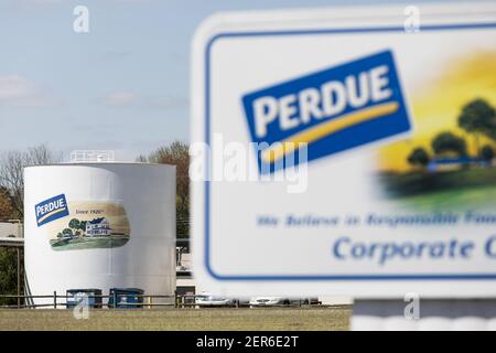 A logo sign outside of a Perdue Farms poultry processing plant in ...