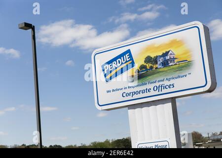 A logo sign outside of a Perdue Farms poultry processing plant in ...