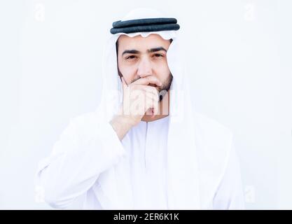 Arabic guy sitting and thinking of something Stock Photo - Alamy