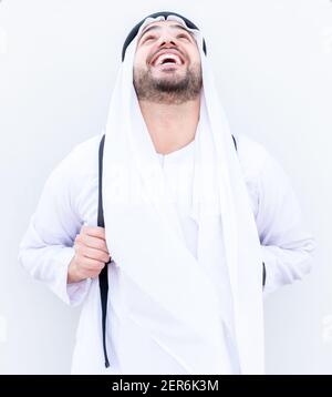 Arabic guy wearing his backpack and preparing to school Stock Photo - Alamy