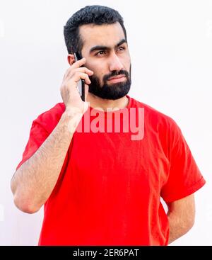 Guy making an expression of being angry and sad Stock Photo - Alamy