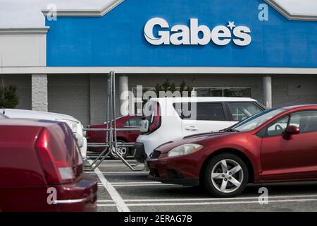 A logo sign outside of a Gabe's retail store location in Martinsburg ...