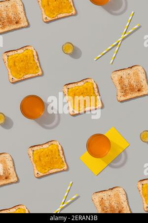 Pattern with toast and lemon jam on gray background Stock Photo - Alamy