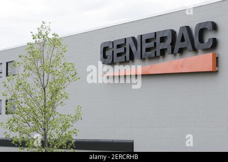 A logo sign outside of the headquarters of Generac Power Systems in ...