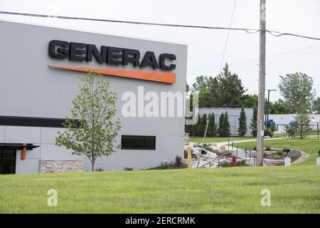 A logo sign outside of the headquarters of Generac Power Systems in ...